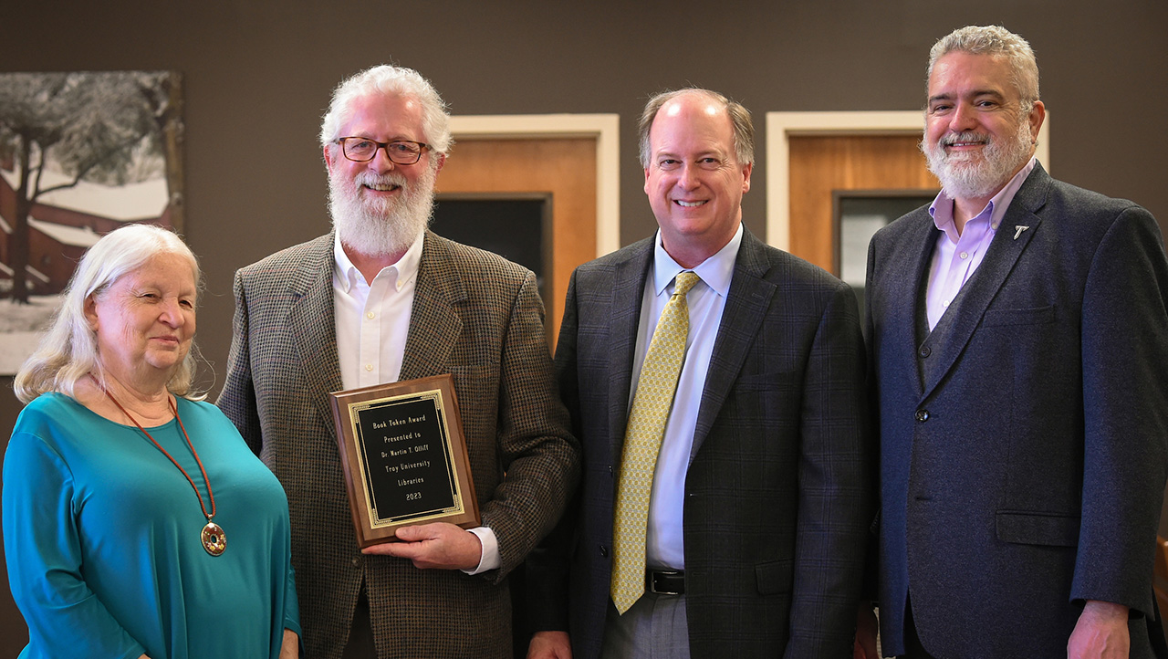 Olliff receives Troy University Libraries’ Book Token Award - Troy Today